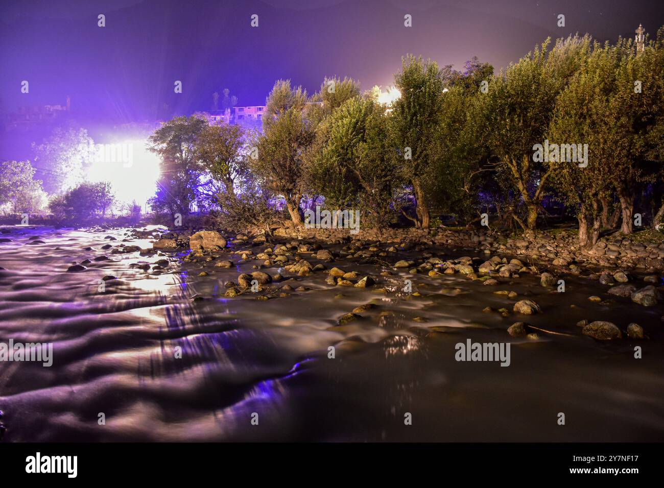 Pahalgam, India. 30th Sep, 2024. A long exposure photo shows a stream ...