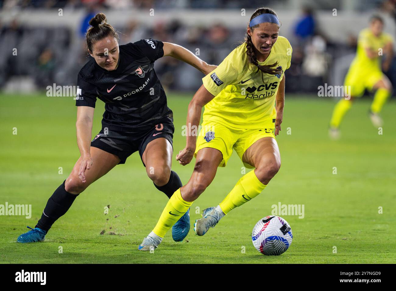 Washington Spirit forward Ashley Hatch (33) is defended by Angel City ...