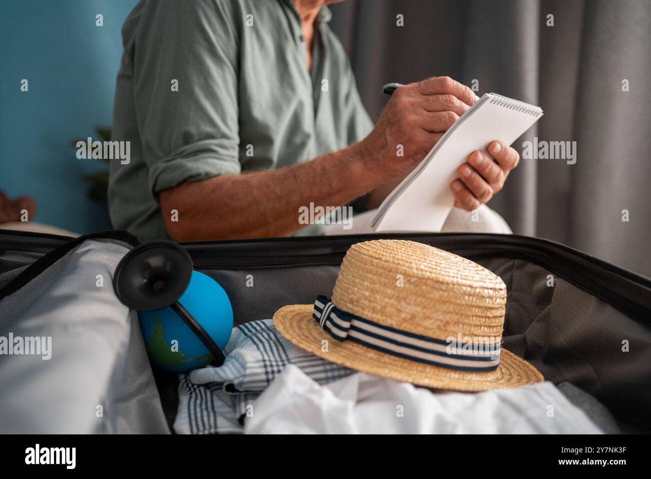 Vacation, holiday and travel concept. traveler senior man holding ...