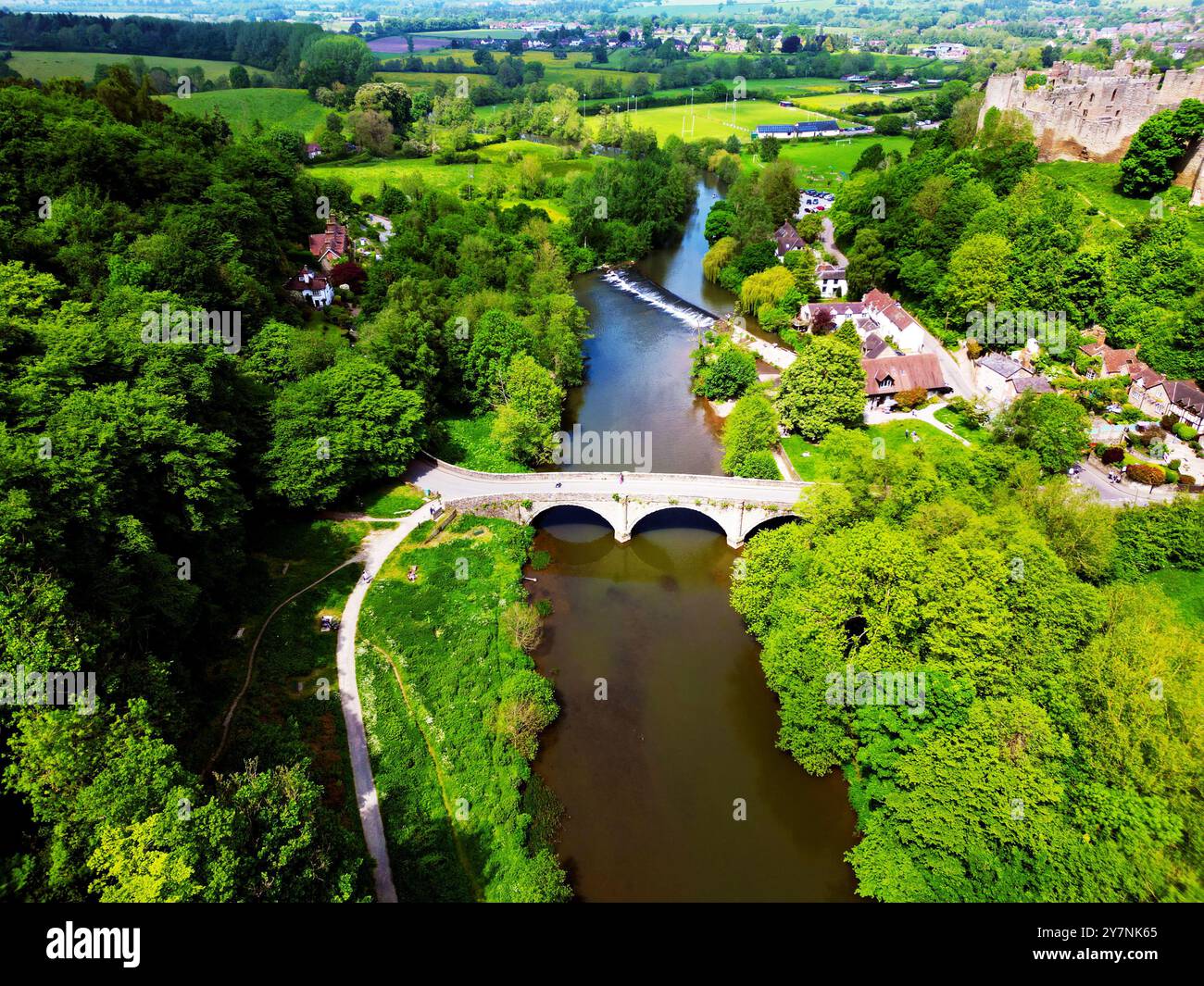 An aerial view of Dinham Bridge in Ludlow, with the historic castle in ...