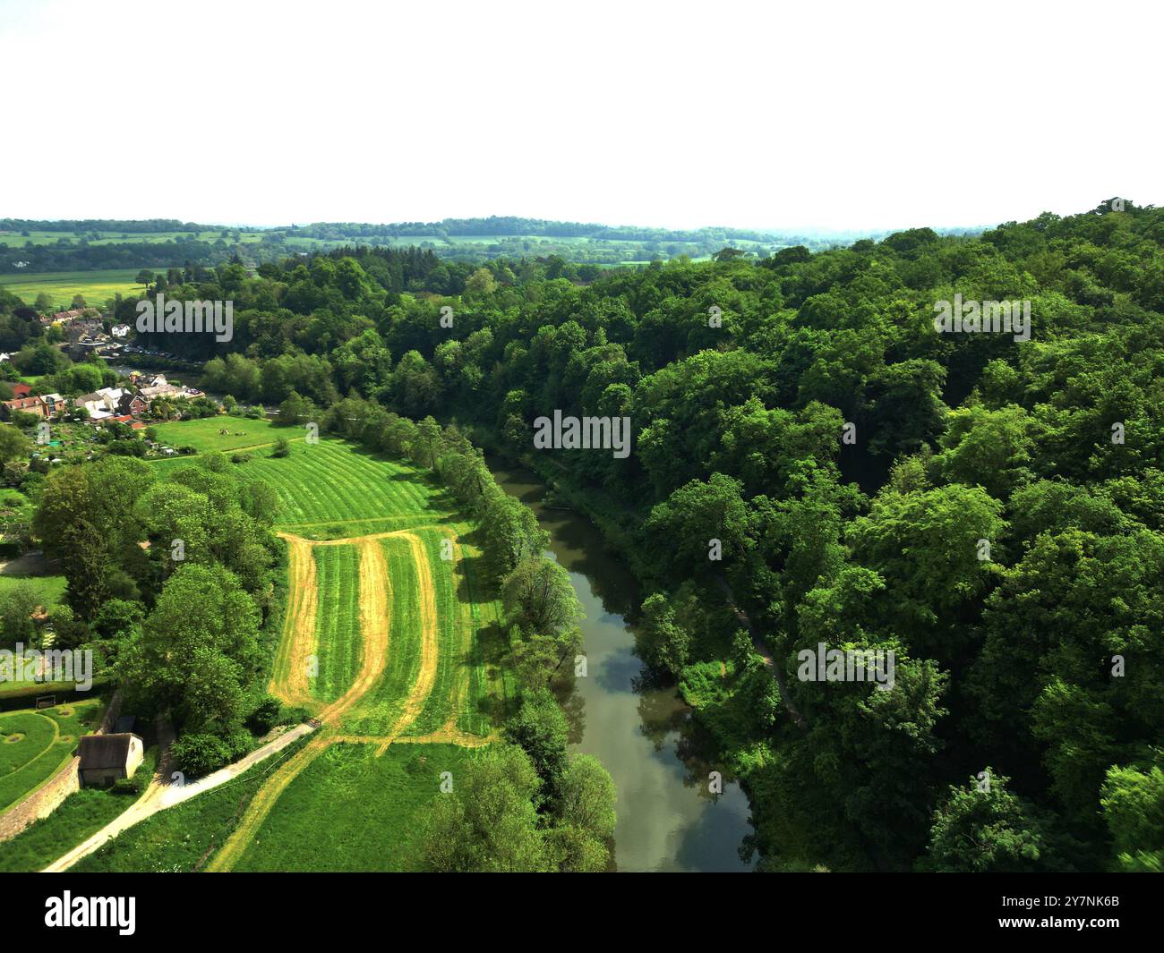 An aerial view of lush landscape with the River Teme flowing through ...