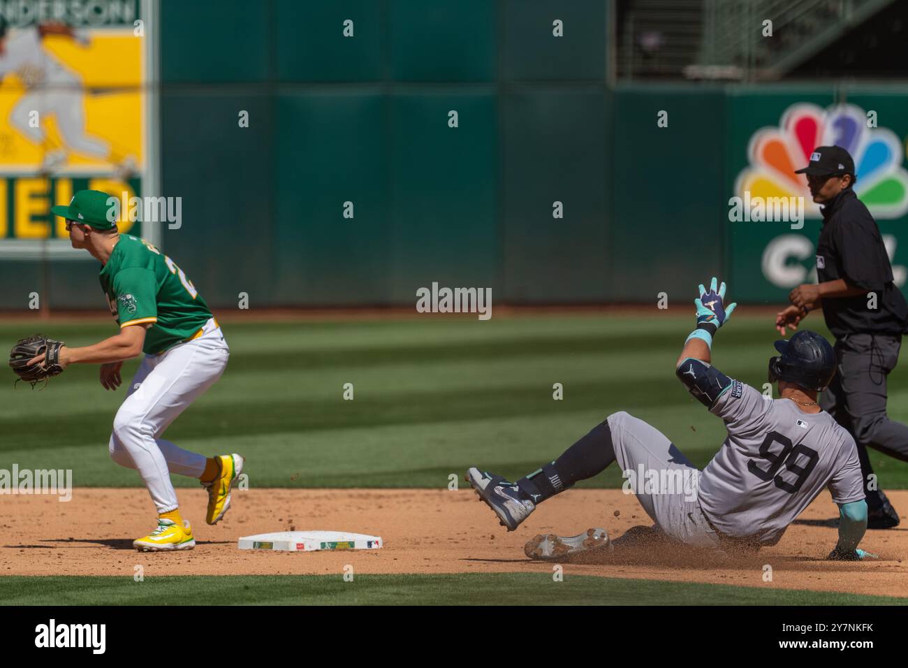 New York Yankees Outfielder Aaron Judge (99) slides into second base ...