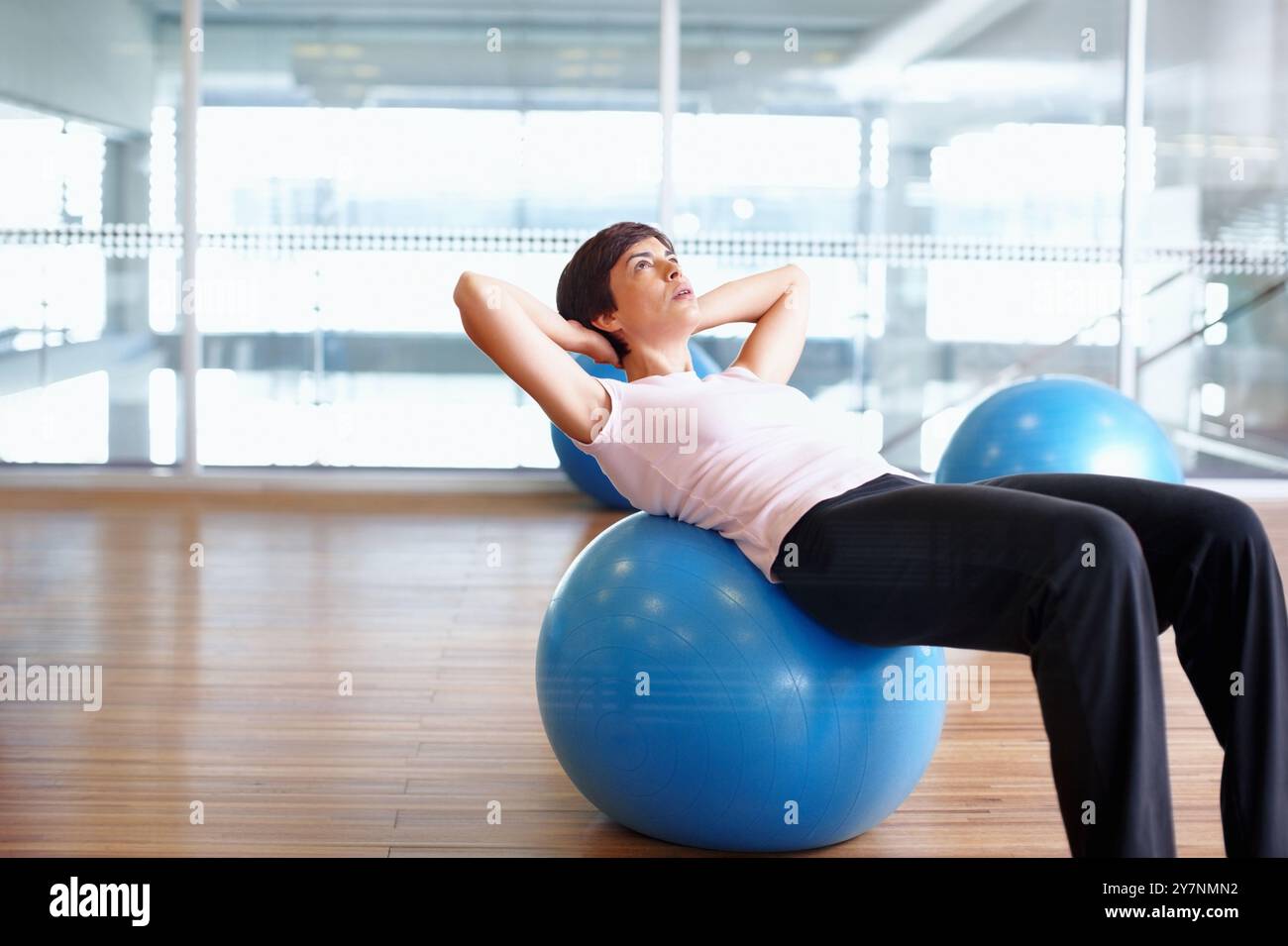 Fitness, woman and exercise ball with sit up for core, abdomen and ...