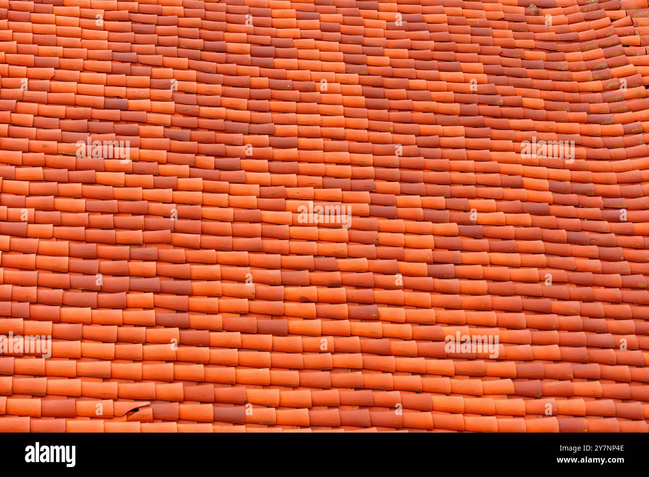 Detailed view of vibrant orange-tiled roof showcasing traditional ...