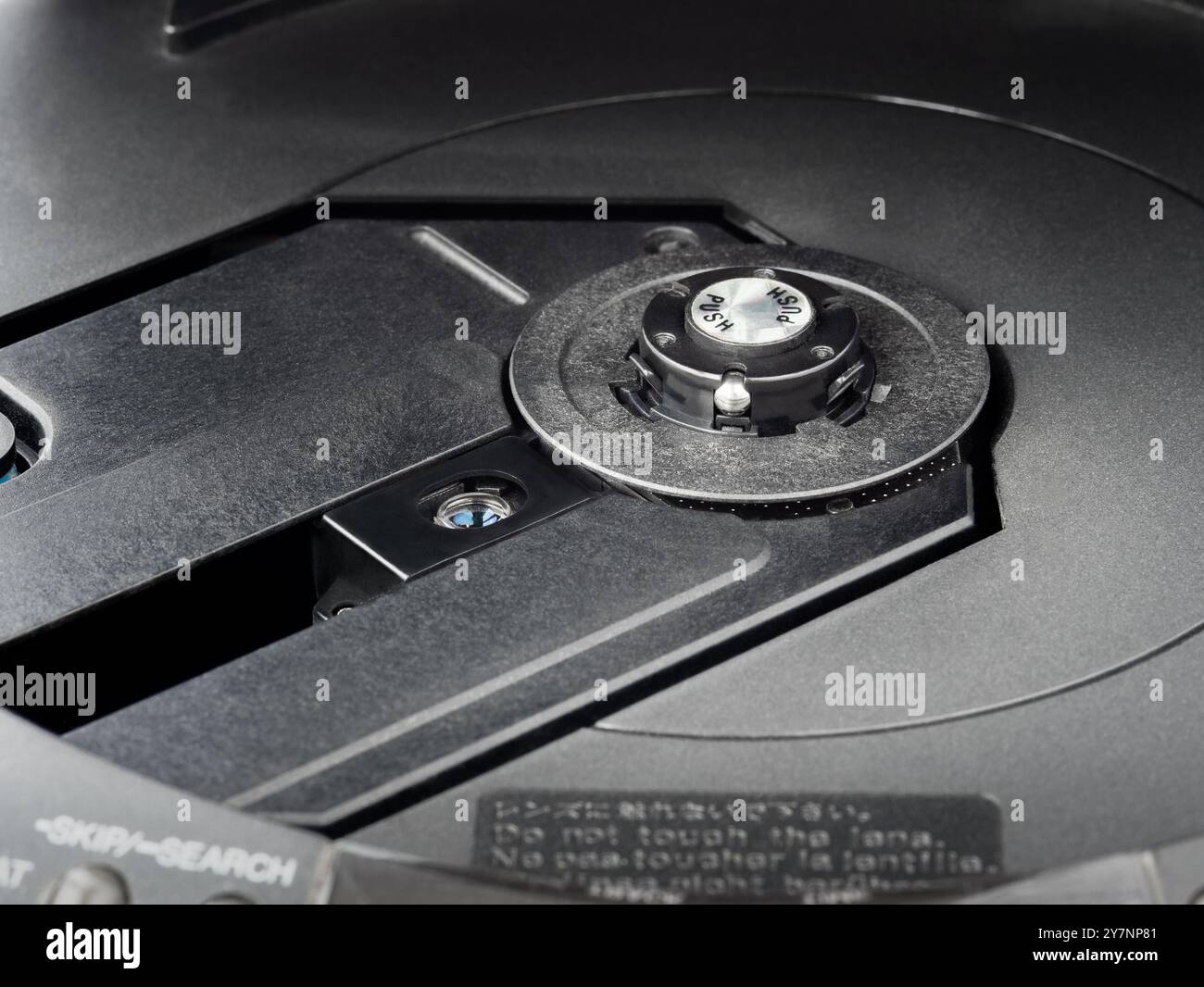 Laser head and spindle with CD holder in portable CD player Stock Photo - Alamy