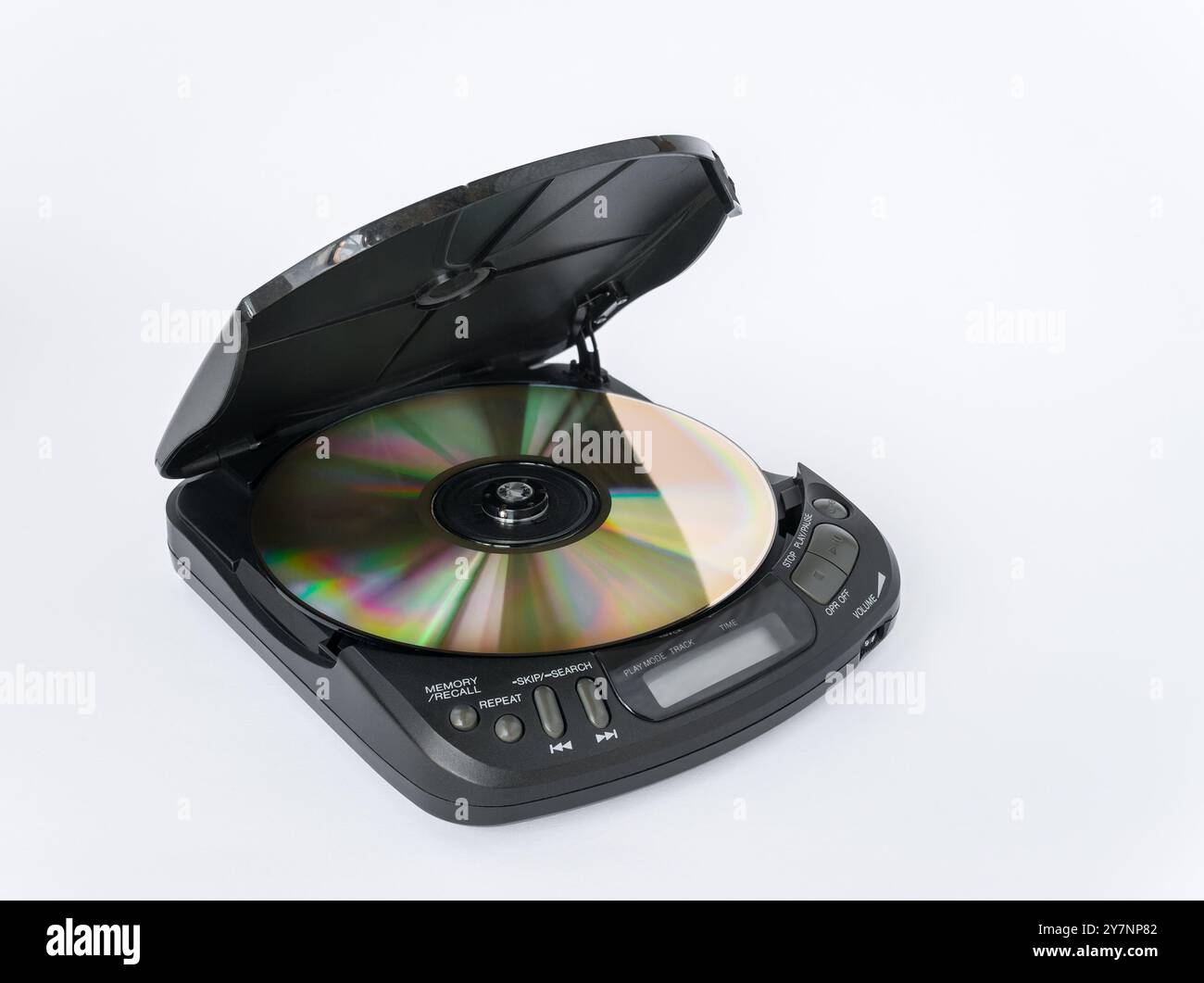Close-up view of CD player with open lid and golden CD inside isolated ...