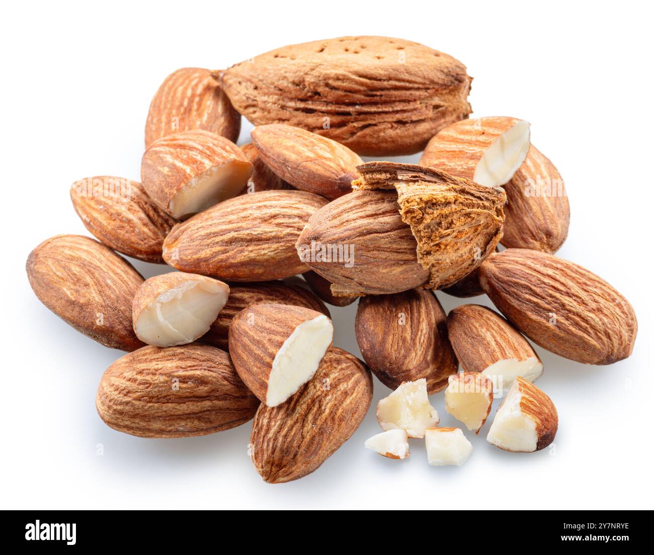 Pile of shelled almond nuts and almond pieces, isolated on white ...