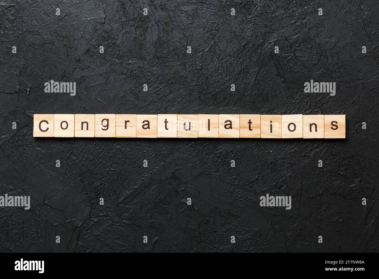 congratulations word written on wood block. congratulations text on ...