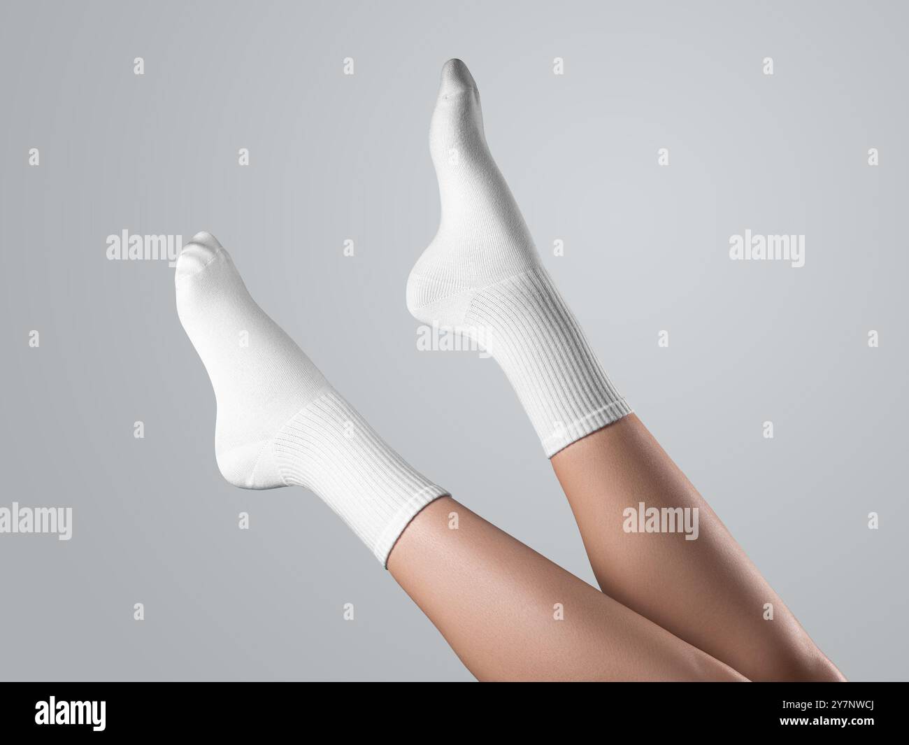 Mockup of white long socks on women's foot, with stretched toes ...