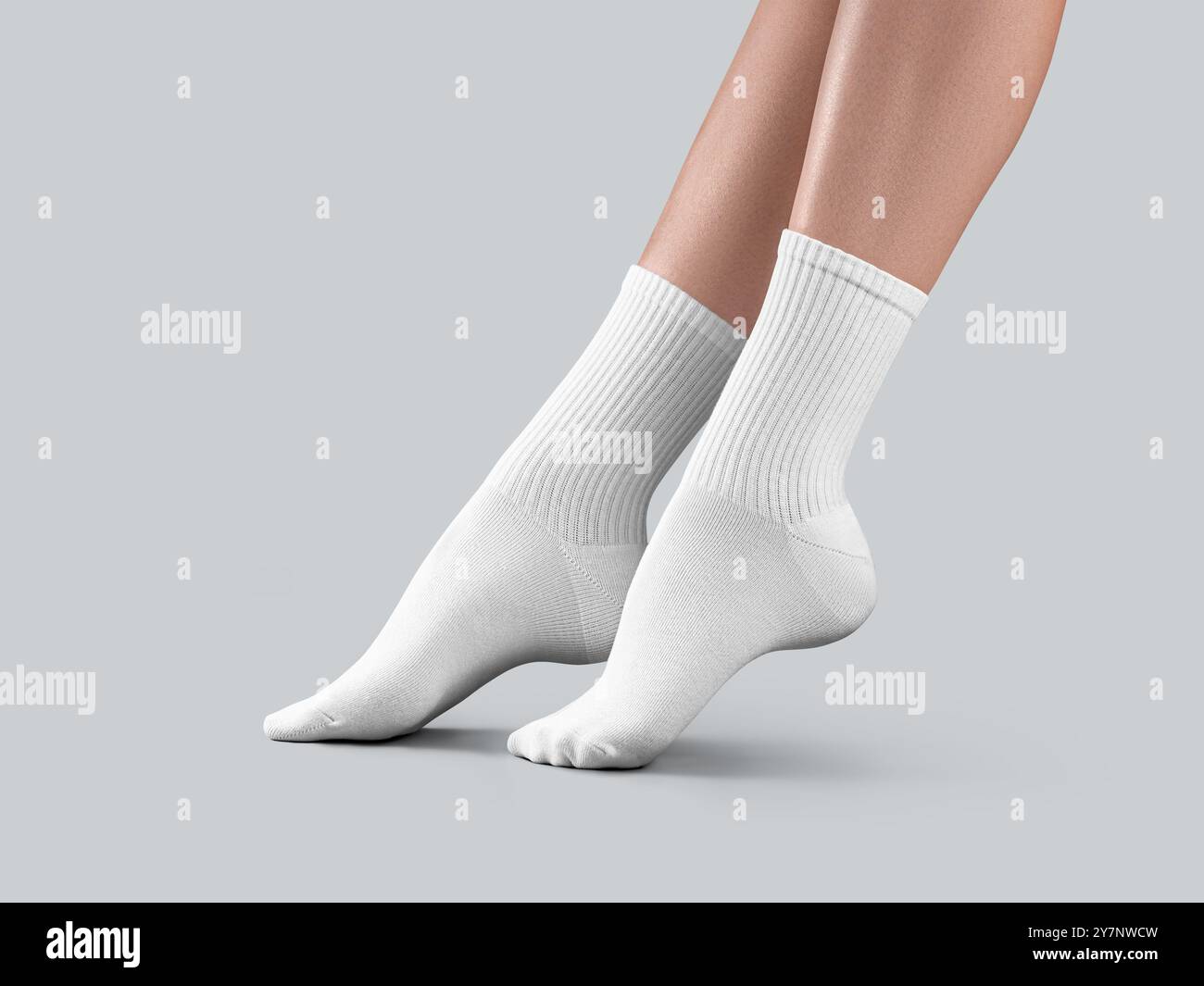 Mockup of white long socks with high elastic band on women's beautiful ...