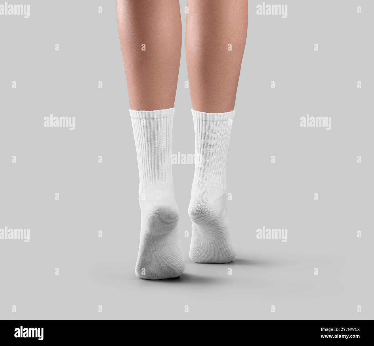 Mockup of white high socks on tiptoes, back view, long clothes on women ...
