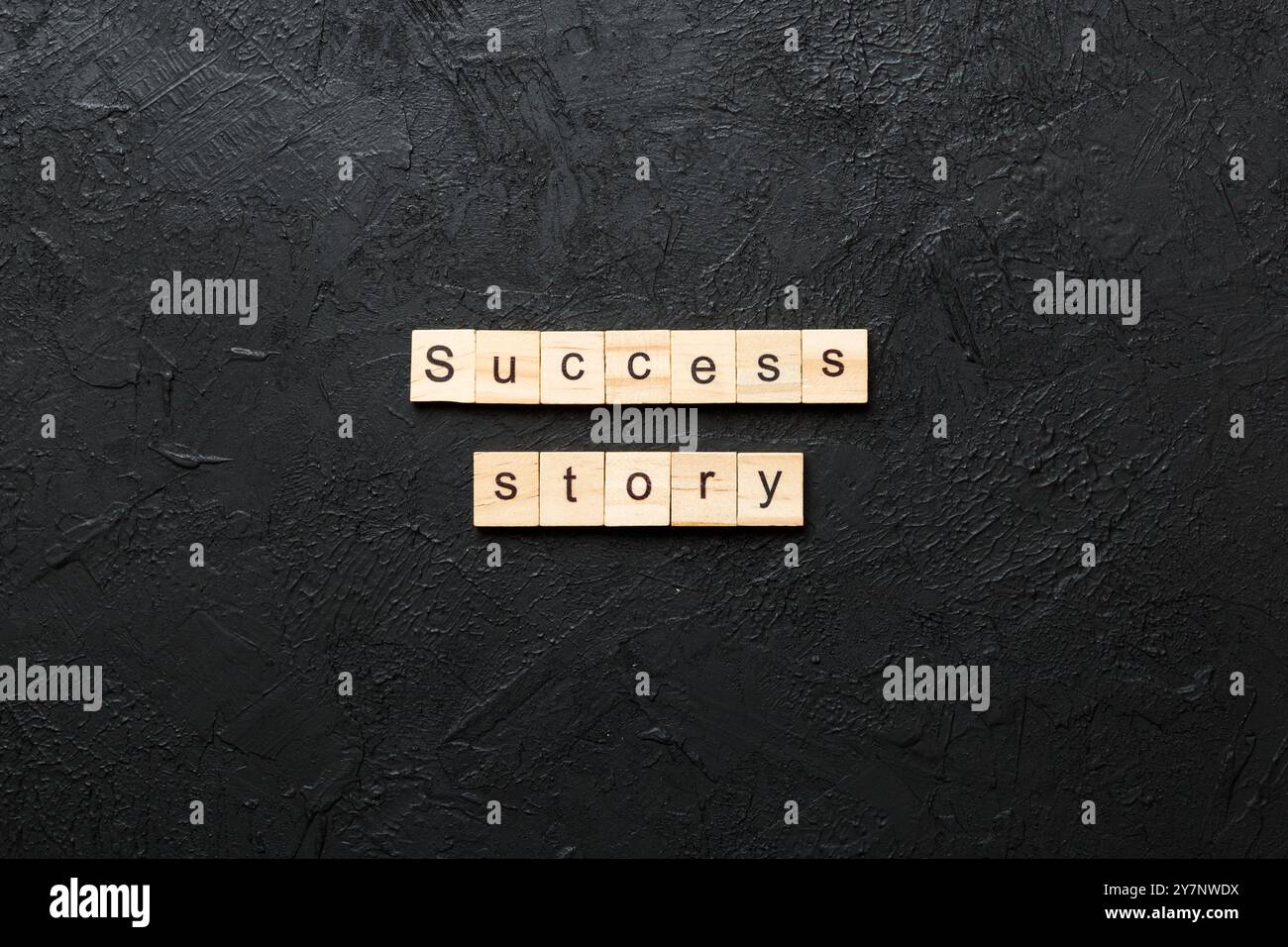 Success story word written on wood block. Success story text on table ...