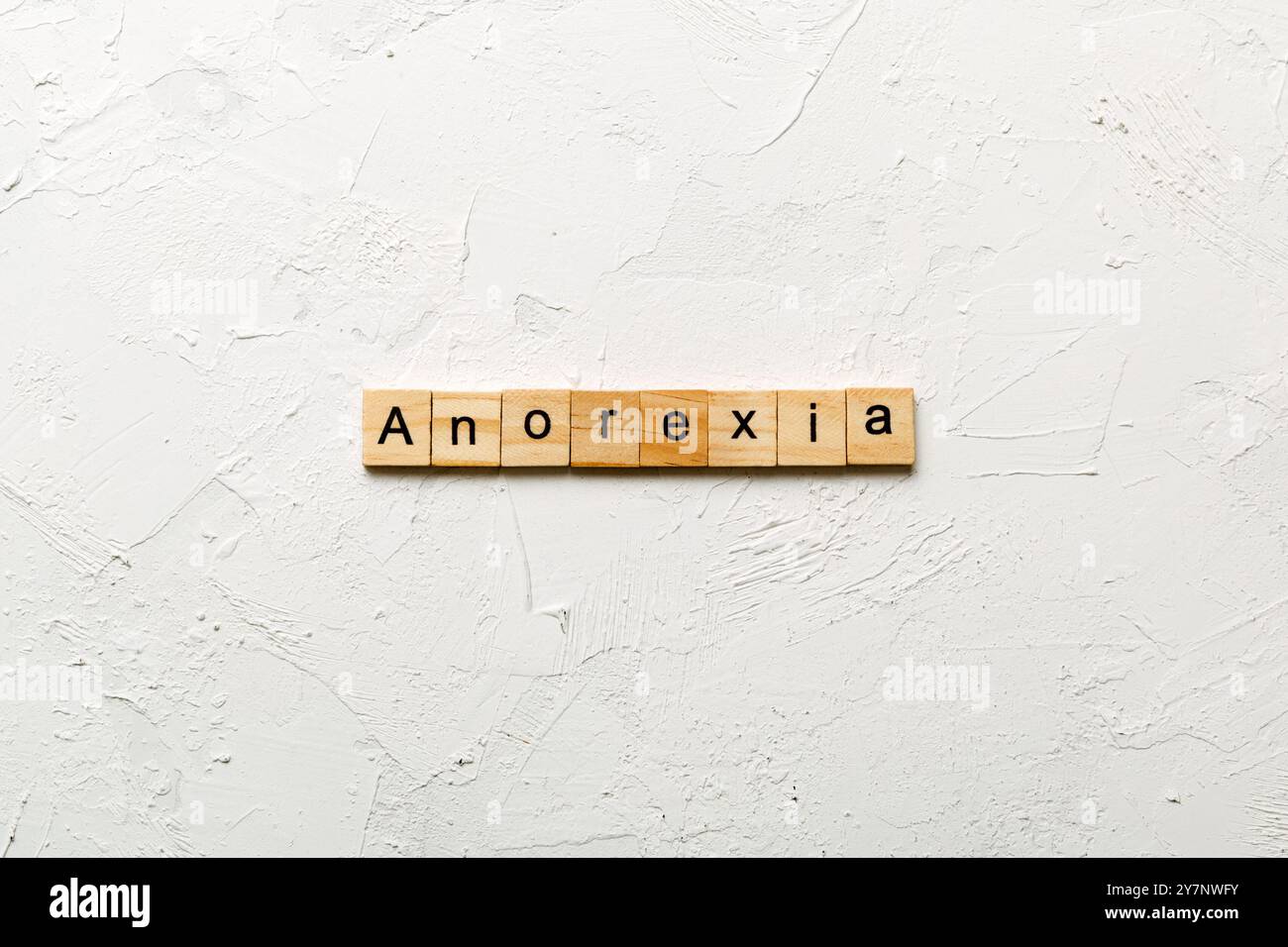 anorexia word written on wood block. anorexia text on table, concept ...