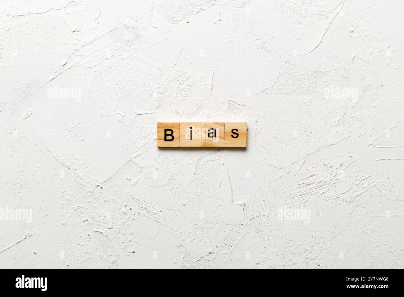 BIAS word written on wood block. BIAS text on cement table for your ...