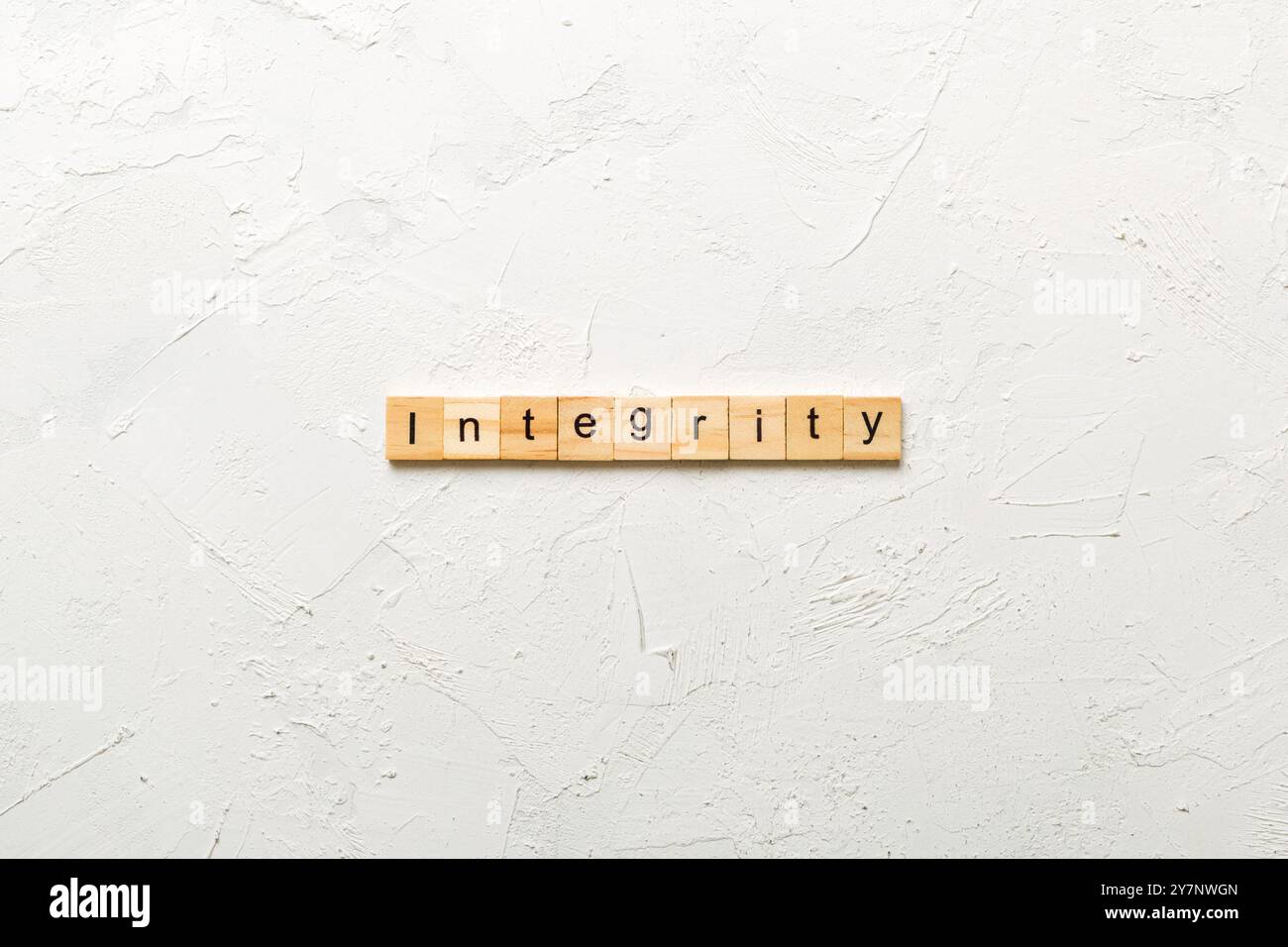 integrity word written on wood block. integrity text on table, concept ...