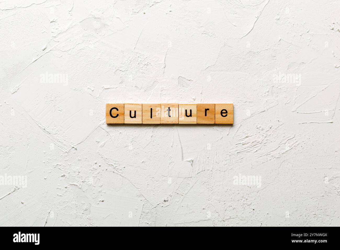 Culture word written on wood block. Culture text on cement table for ...