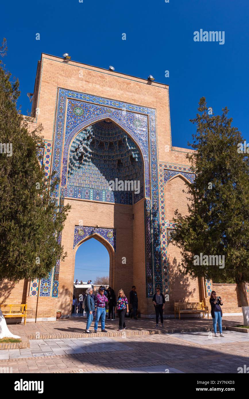 Samarkand, Uzbekistan - March 25, 2024: Tourists are near the entrance ...