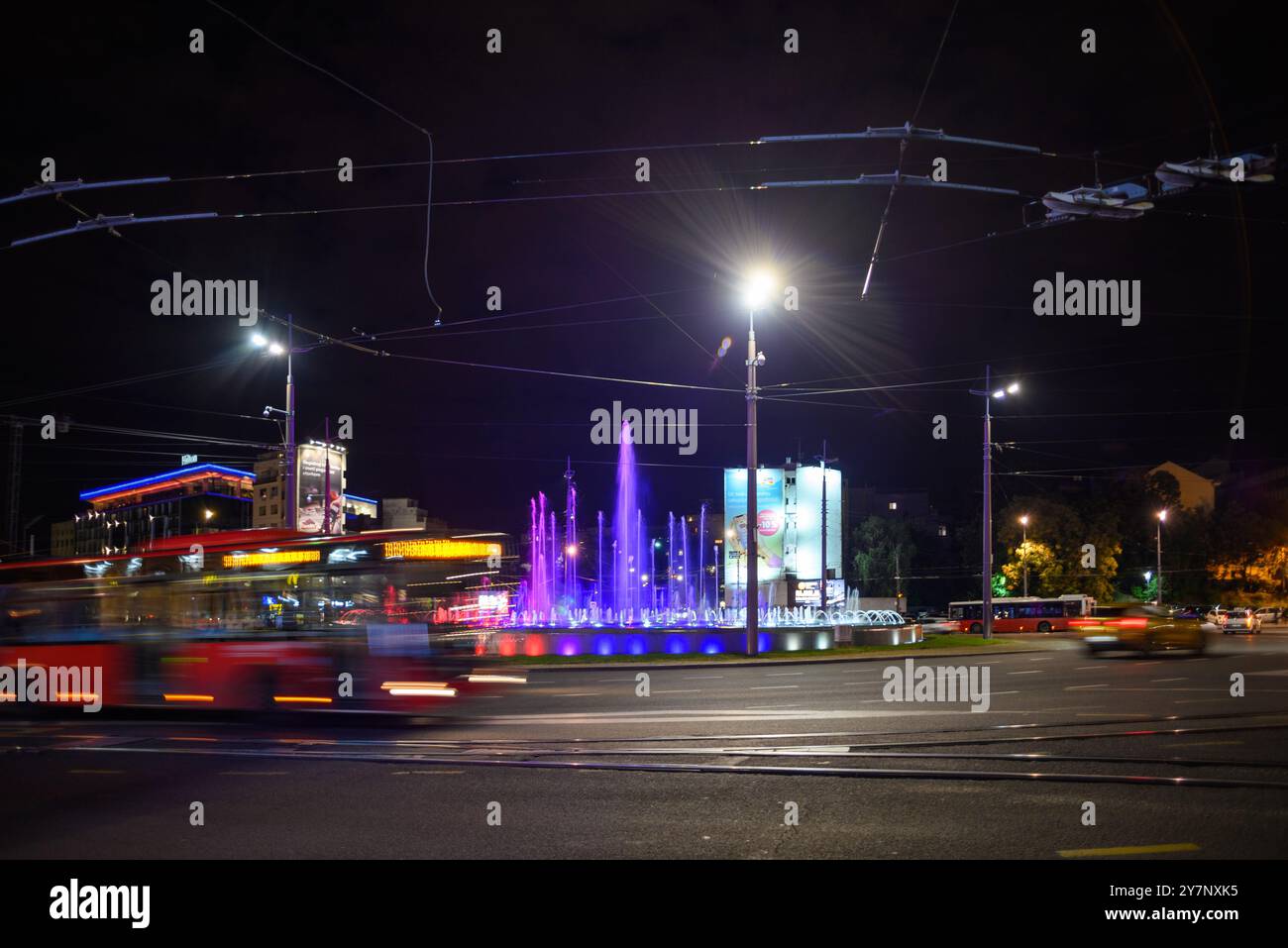 Night view of illuminated fountain at Slavija square roundabout in ...