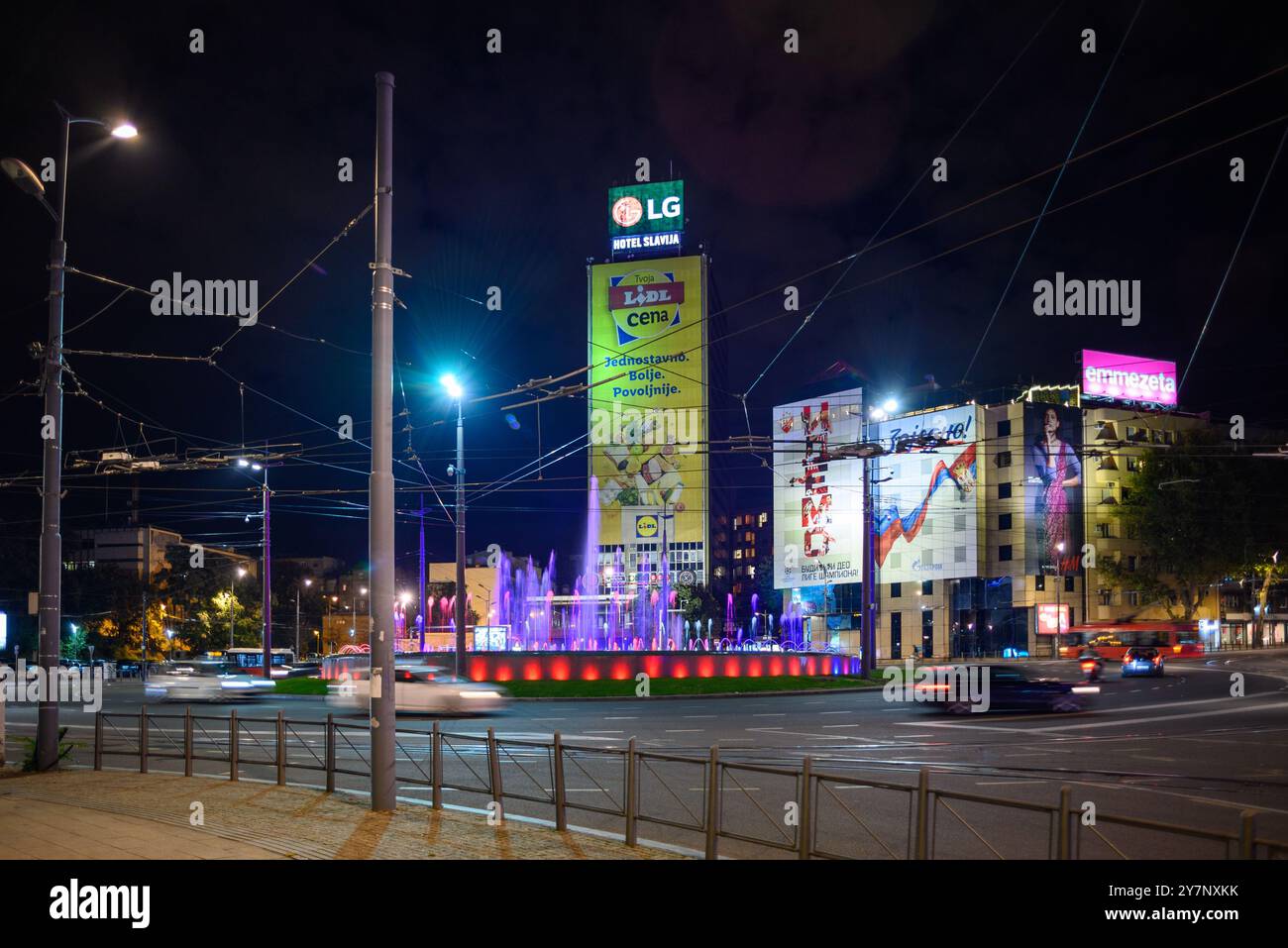 Night view of illuminated fountain at Slavija square roundabout in ...