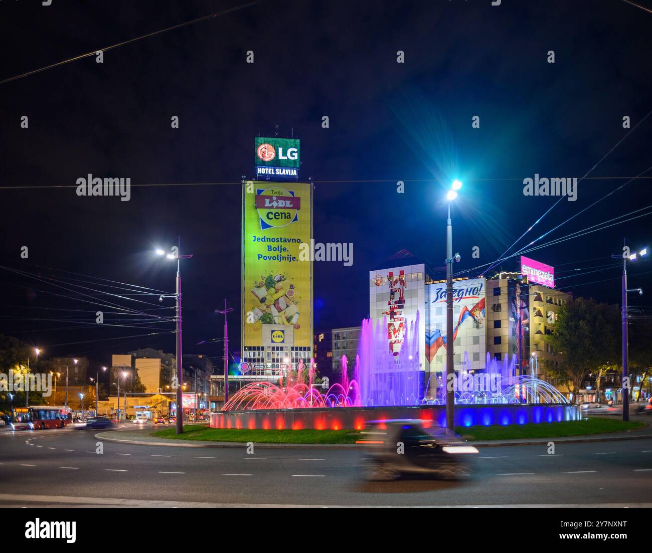 Night view of illuminated fountain at Slavija square roundabout in ...
