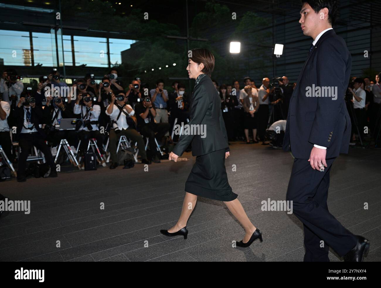Junko Mihara arrives at prime minister's office in Tokyo on October 1 ...