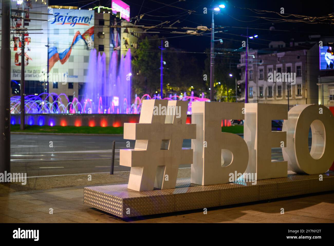 Night view of illuminated fountain at Slavija square roundabout and ...