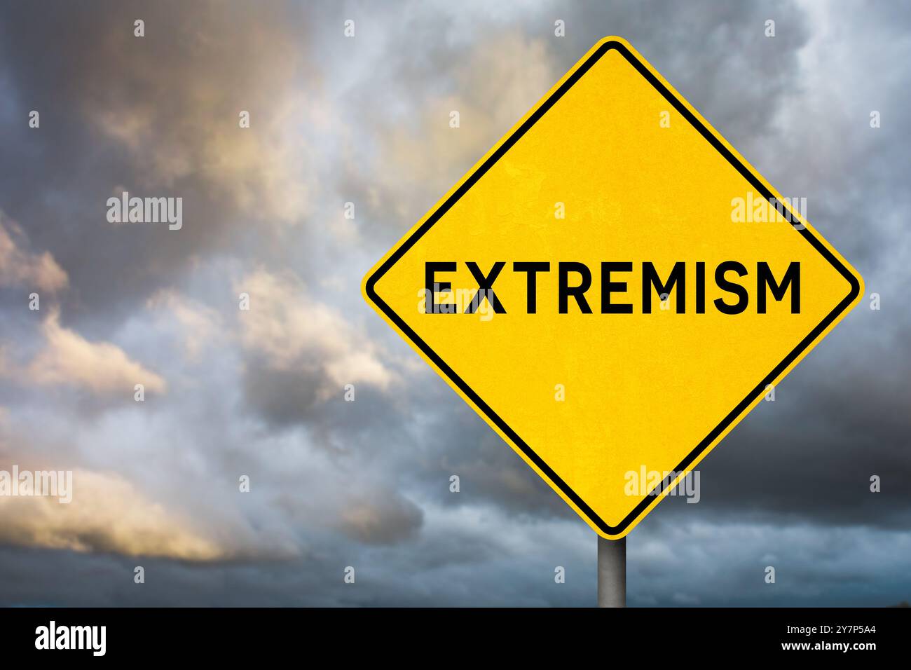 Conceptual Extremism Warning Sign Against Stormy Sky Stock Photo - Alamy