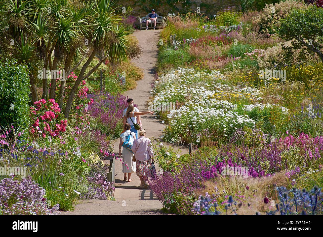 Cambo Gardens Fife Scotland in summer extensive borders and people viewing the colourful flowers ...