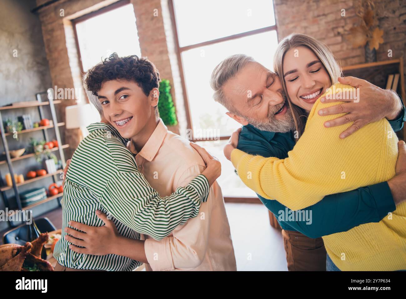 Photo of happy family support each other hugging celebrate thanksgiving ...