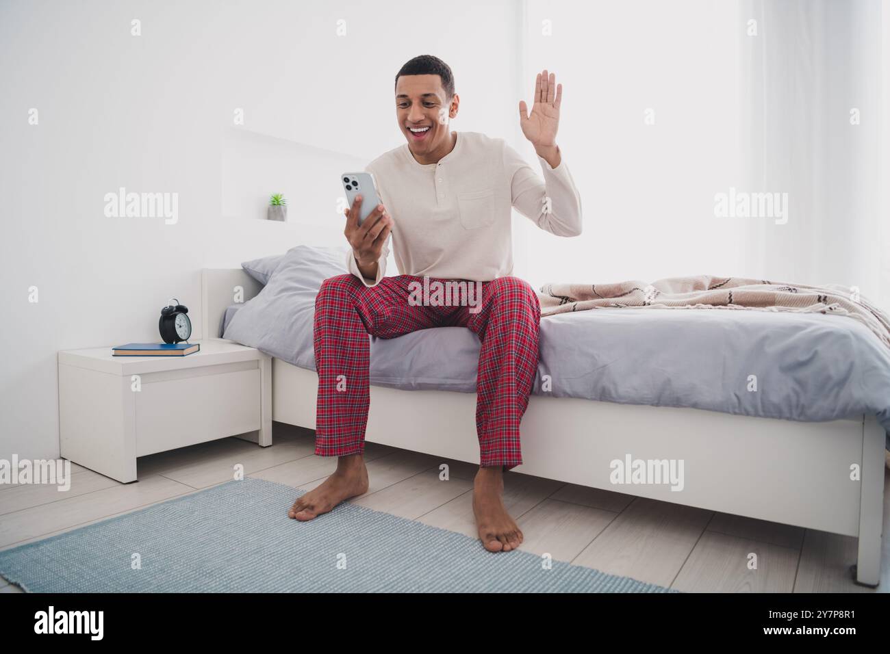 Full body photo of nice young man device video call wave hand hi wear ...