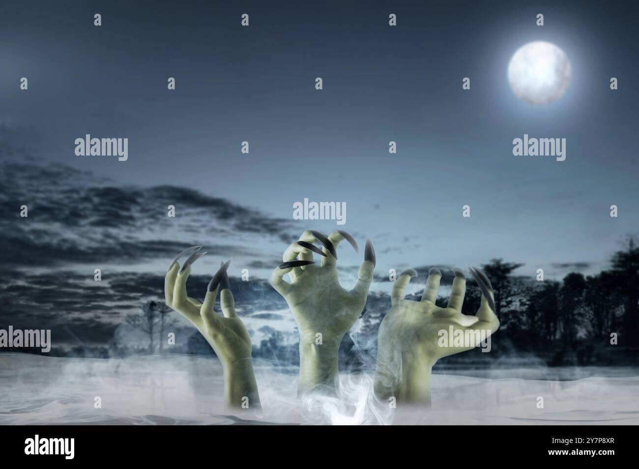 Group of witch hand with long black nail coming out of fog with a full ...