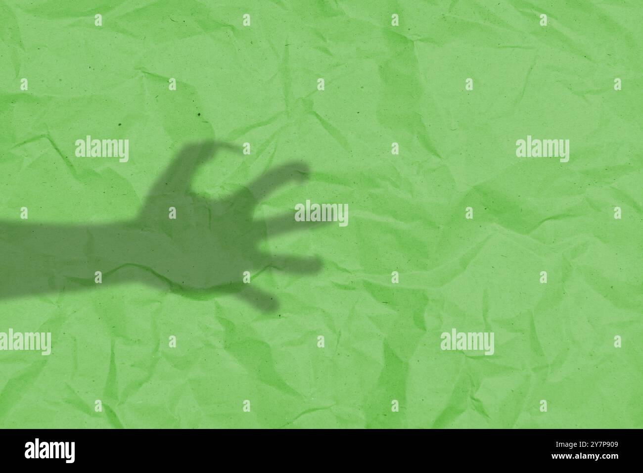 Shade of werewolf hands with fur and black claws on a green background ...