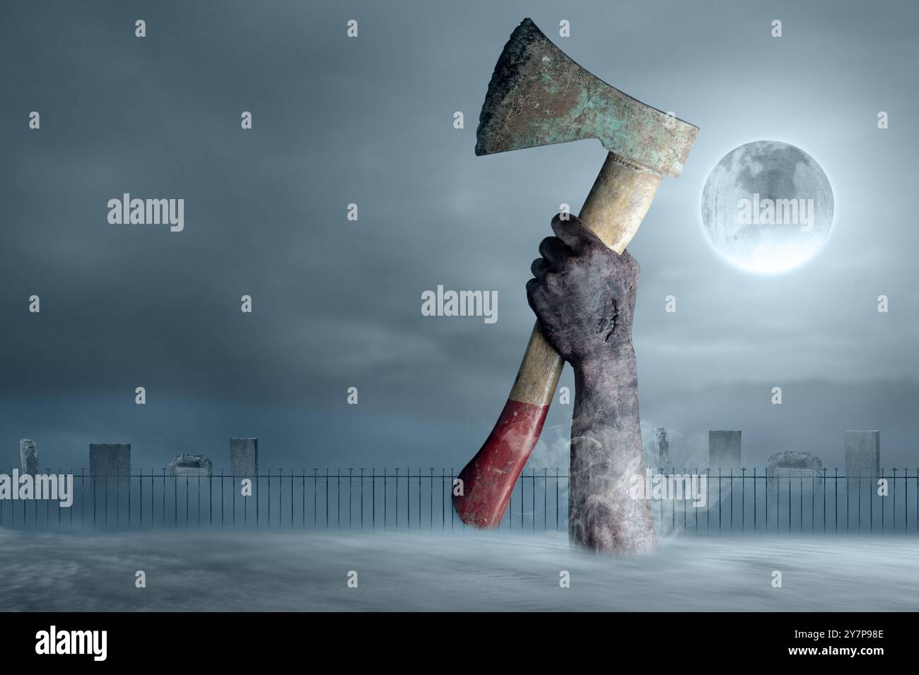 Zombie hands with a bloody wound rising out of ground holding an axe ...