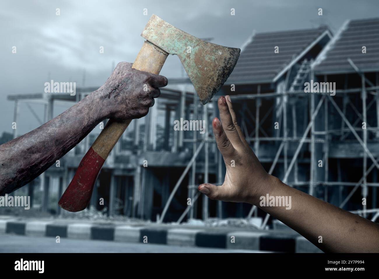 Zombie hand with bloody wound holding axe with midnight background ...