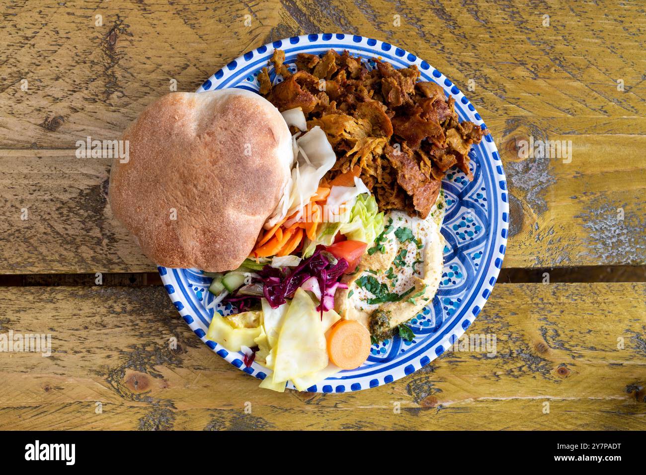 Marinated Seitan shawarma served with houmous, pickled vegetables ...