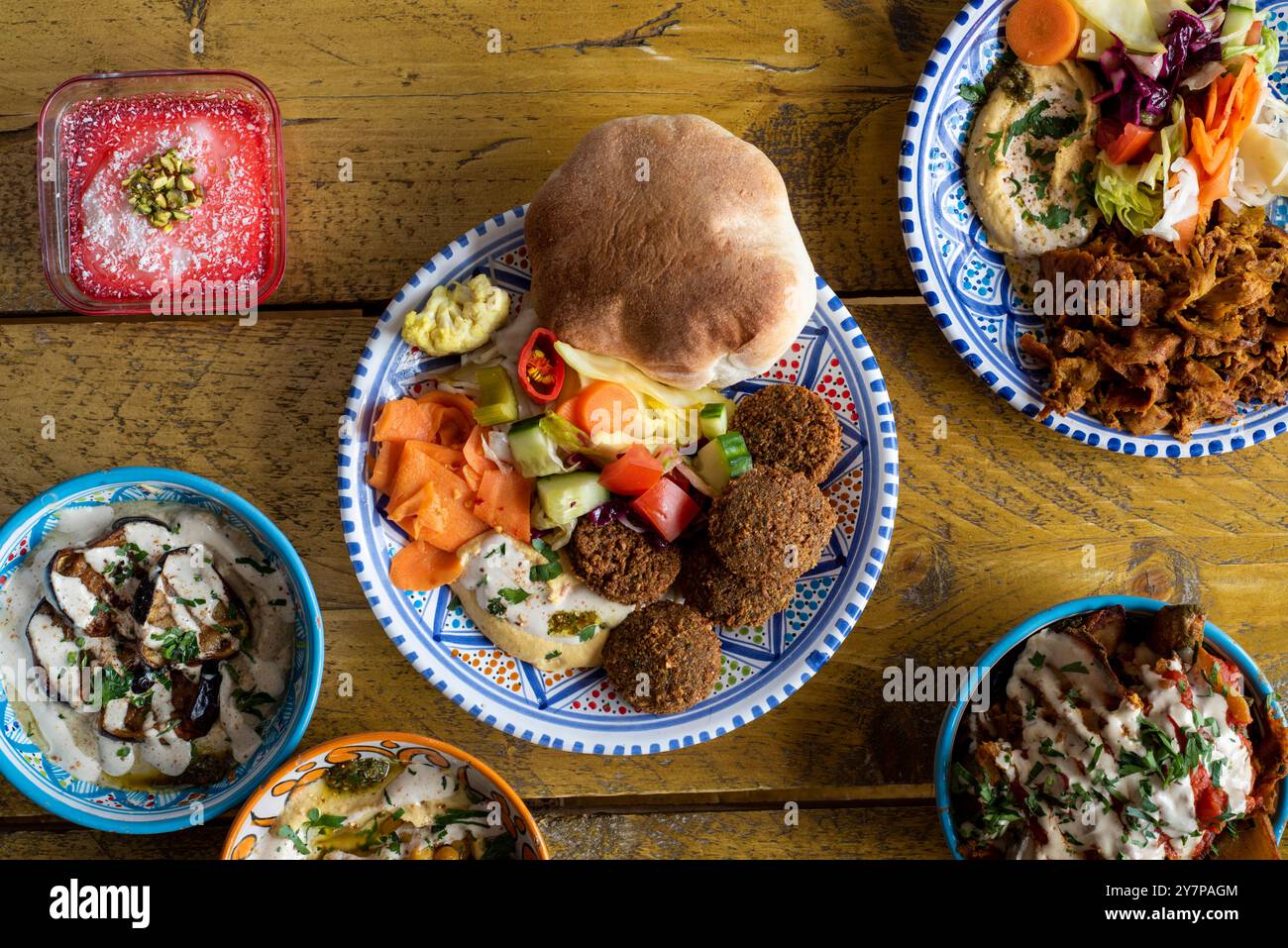 A selection of Iranian food dishes including marinated seitan shawarma ...