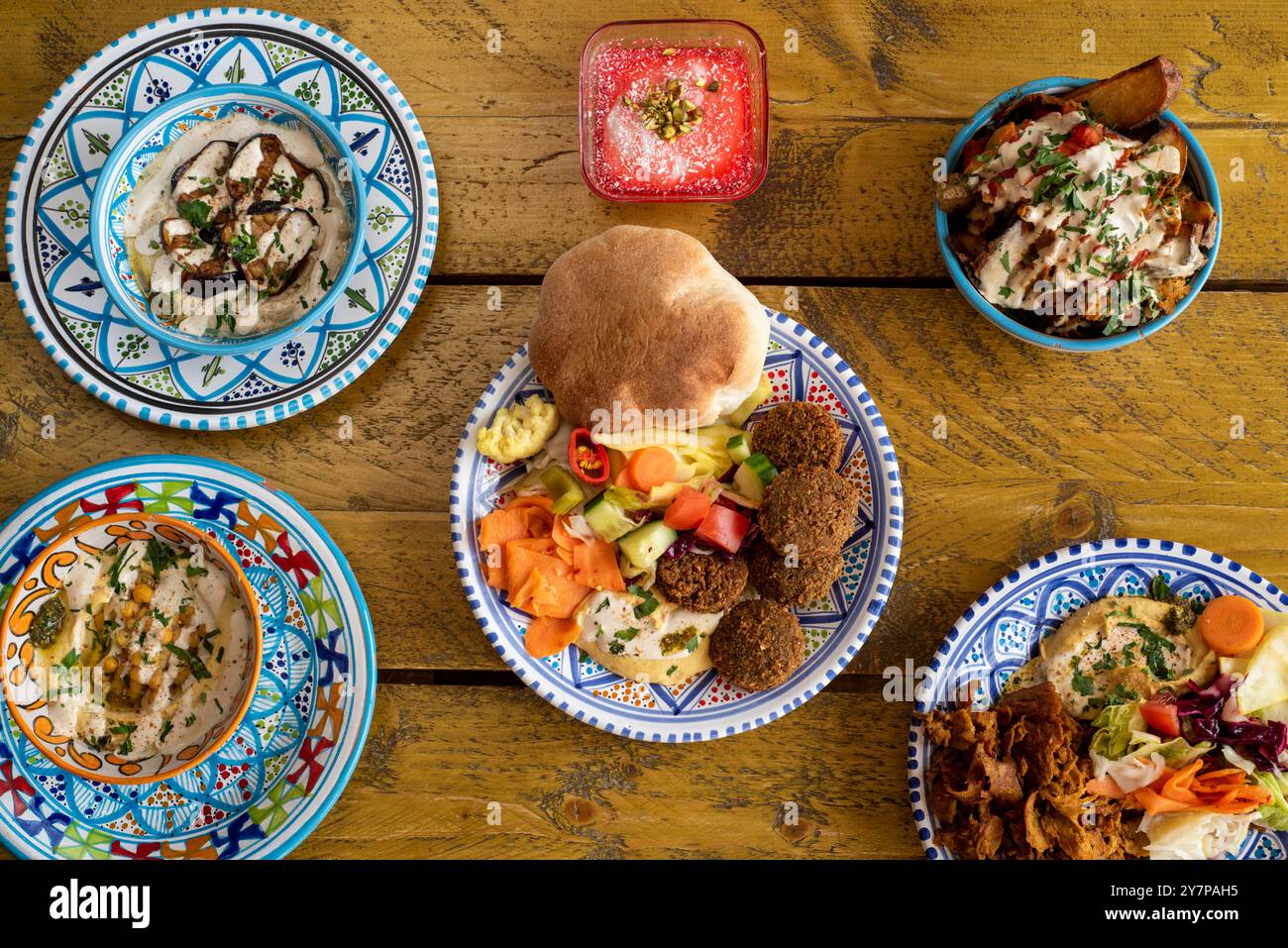 A selection of Iranian food dishes including marinated seitan shawarma ...