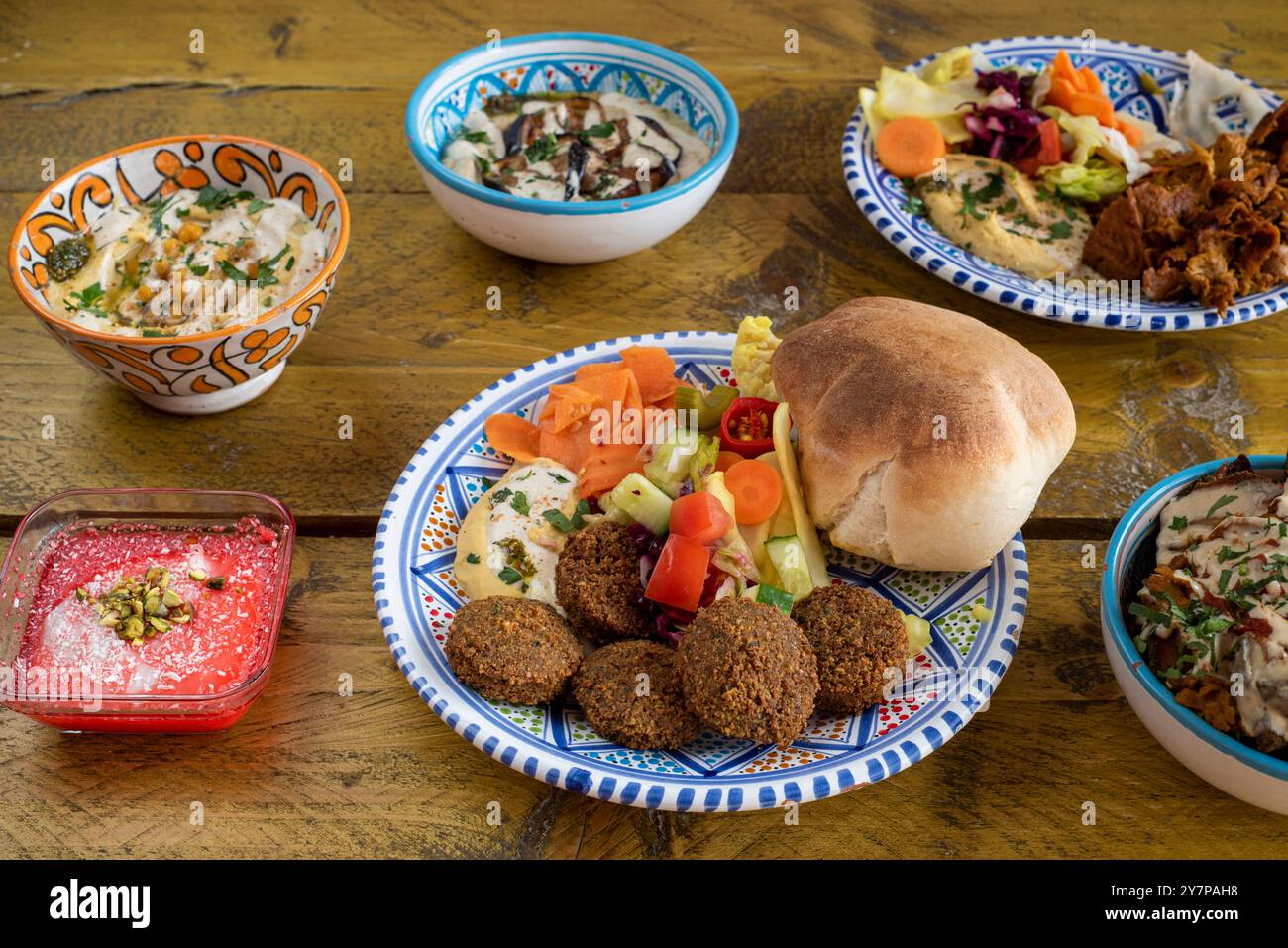 A selection of Iranian food dishes including marinated seitan shawarma ...