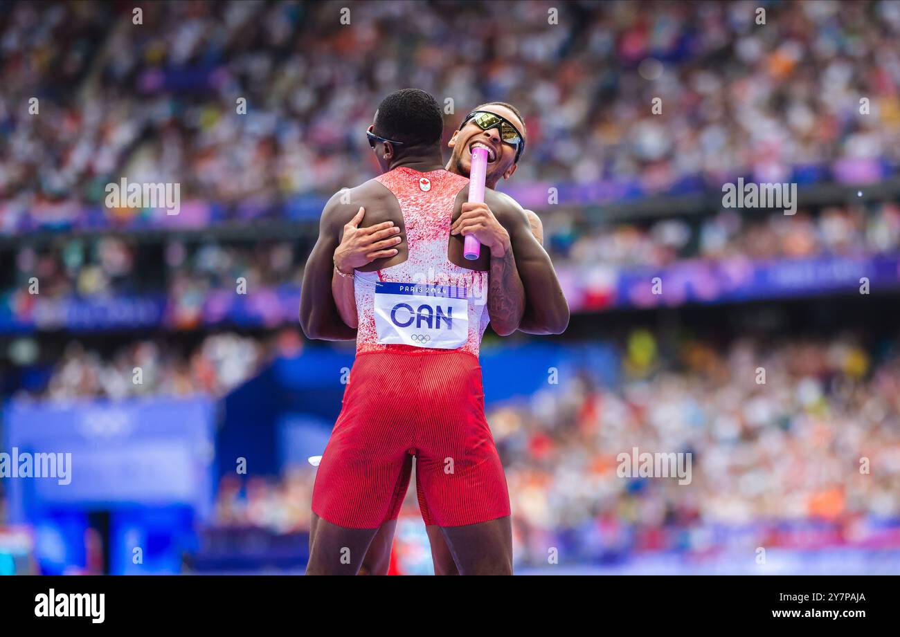 Aaron Brown and Andre De Grasse celebrating her medal in the 4x100 ...