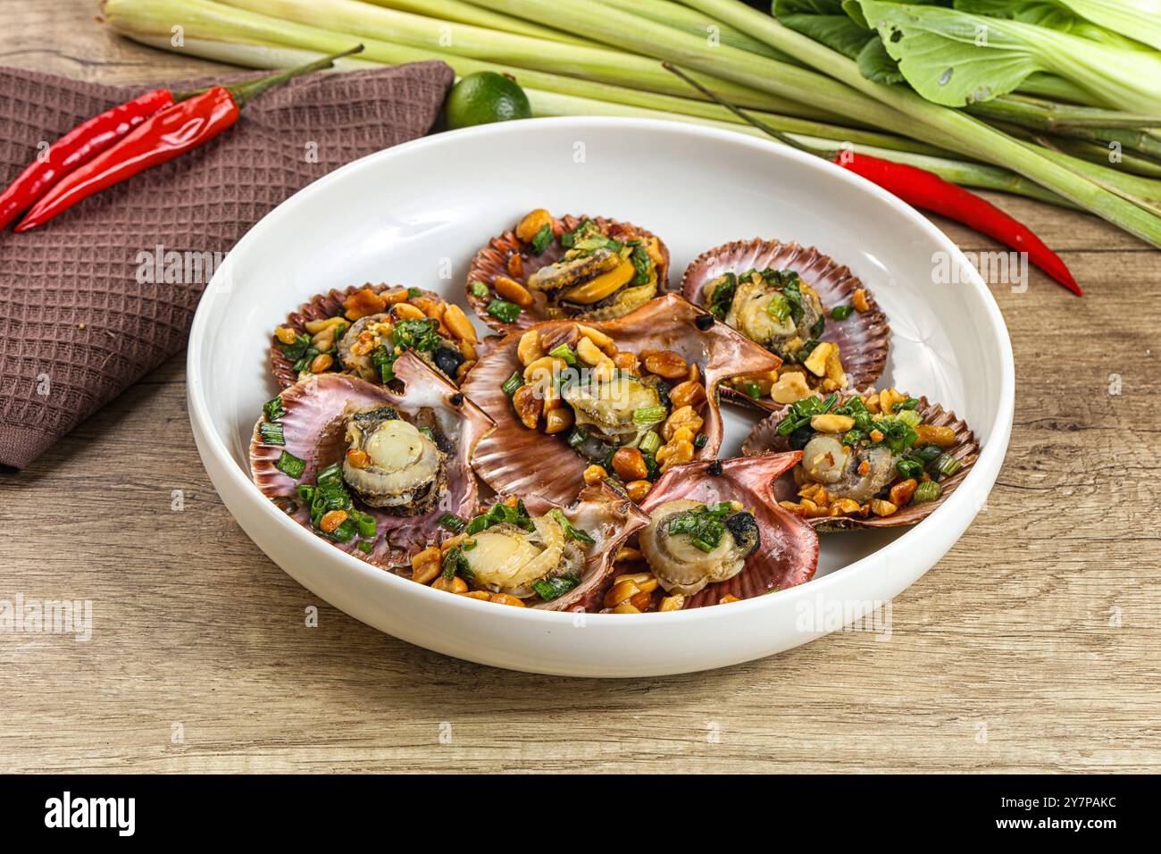 Baked scallops with scalion oil and green onion Stock Photo - Alamy
