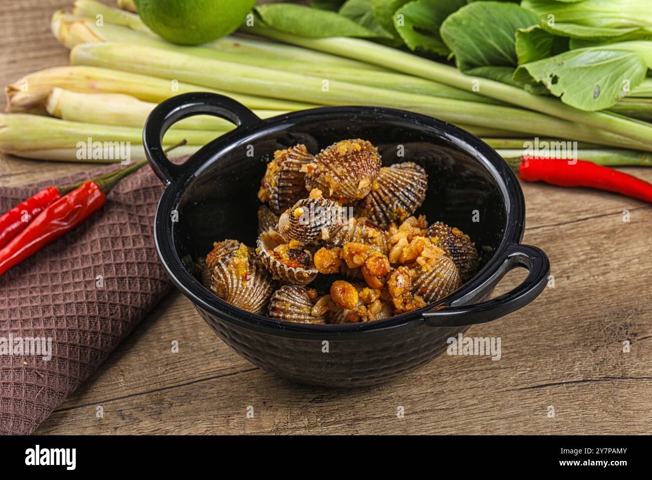 Blood Cockle Fried With Garlic and spices Stock Photo - Alamy
