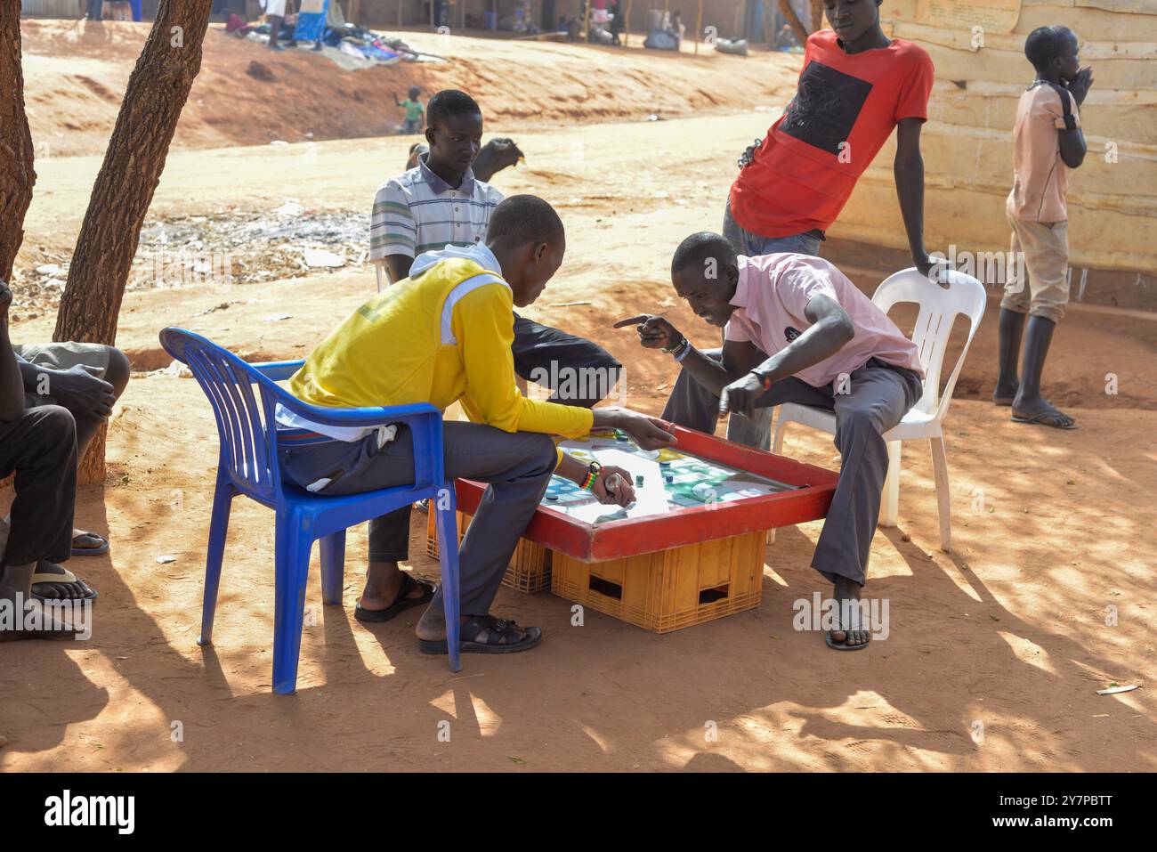 Men playing Ludo in Kampala Uganda Stock Photo - Alamy