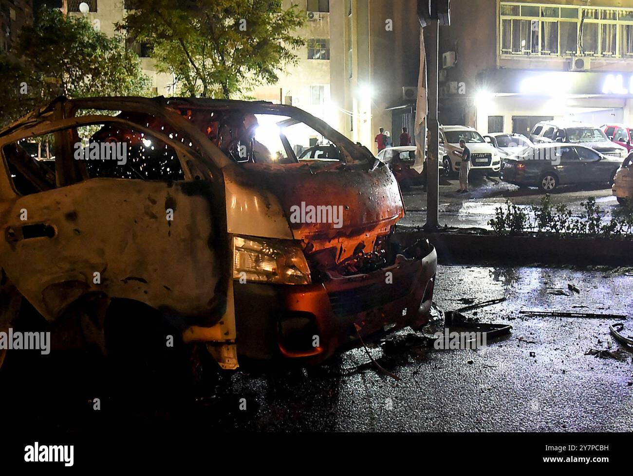 Damascus, Syria. 1st Oct, 2024. A damaged car is seen as a result of an ...