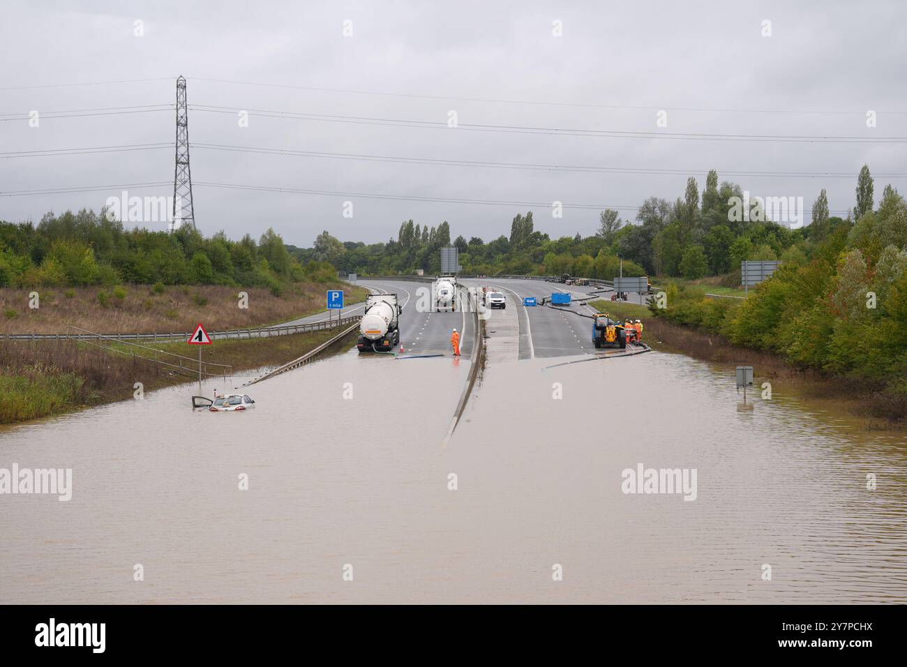 A car remains submerged in flood water on the A421 in Marston Moretaine ...