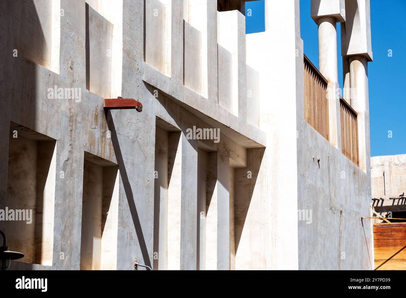 Traditional white Arabic building wall with geometric patterns and ...
