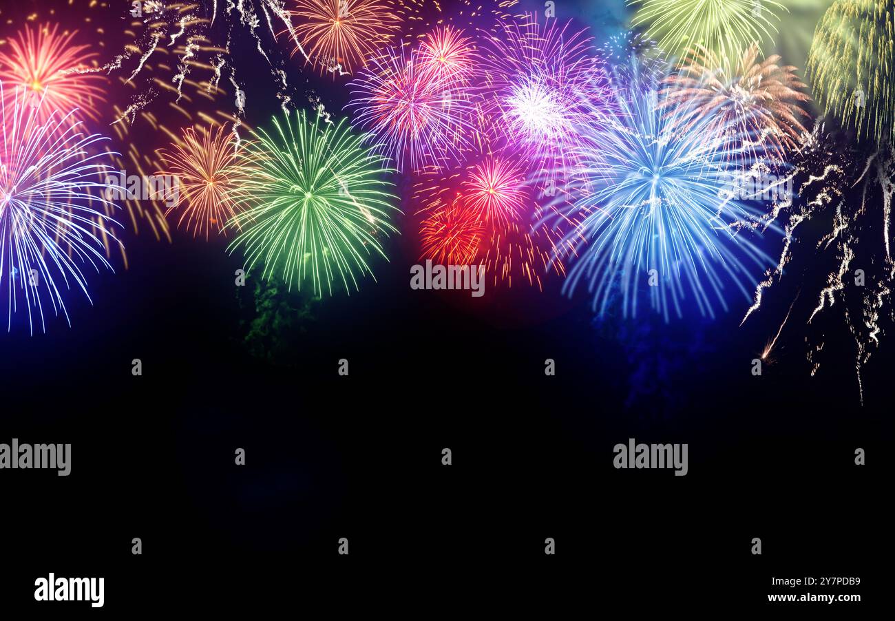 Bright and colourful Fireworks display celebrations background with ...