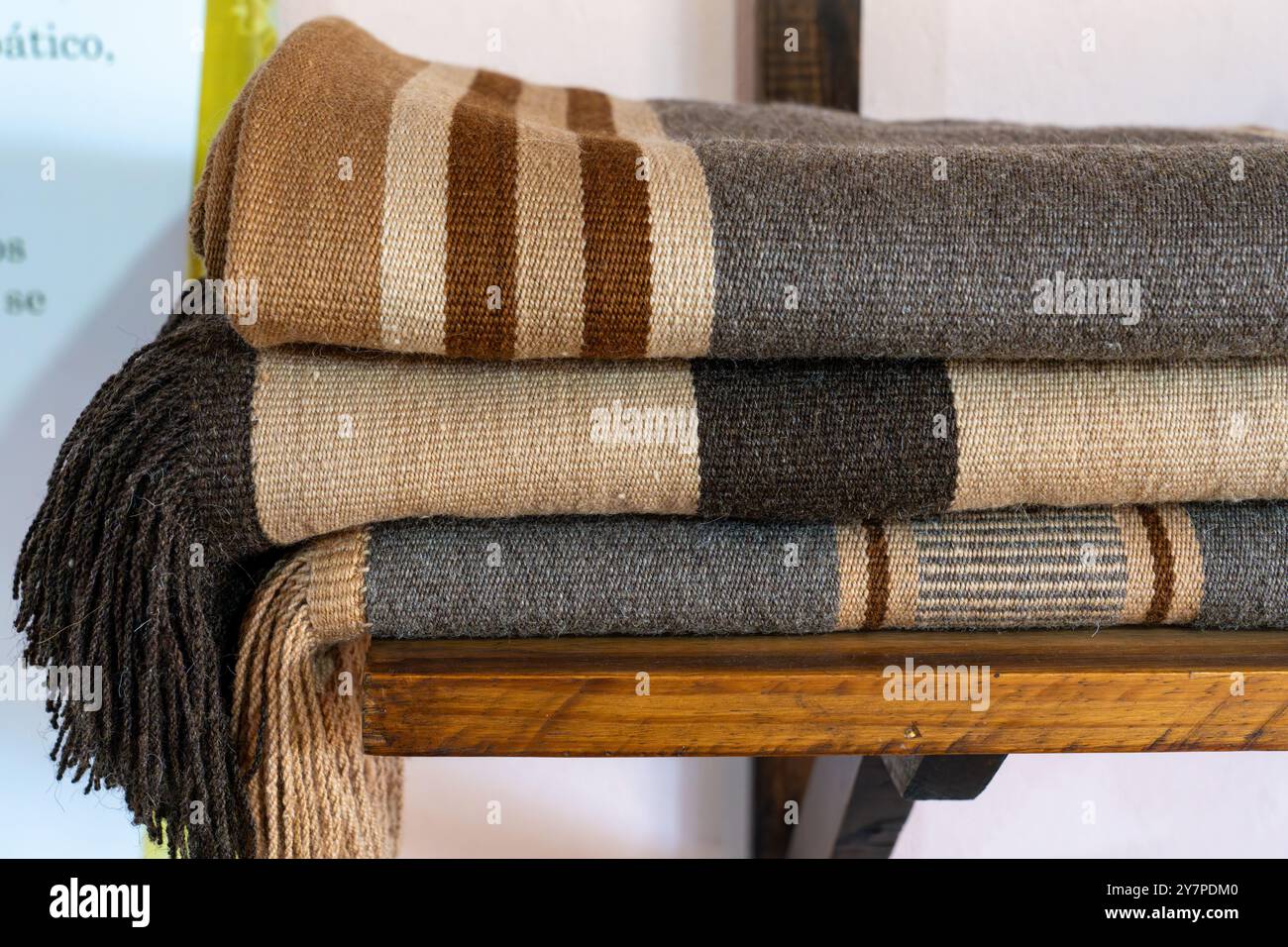 Hand-woven panchos for sale at a home weaving shop in Seclantas ...