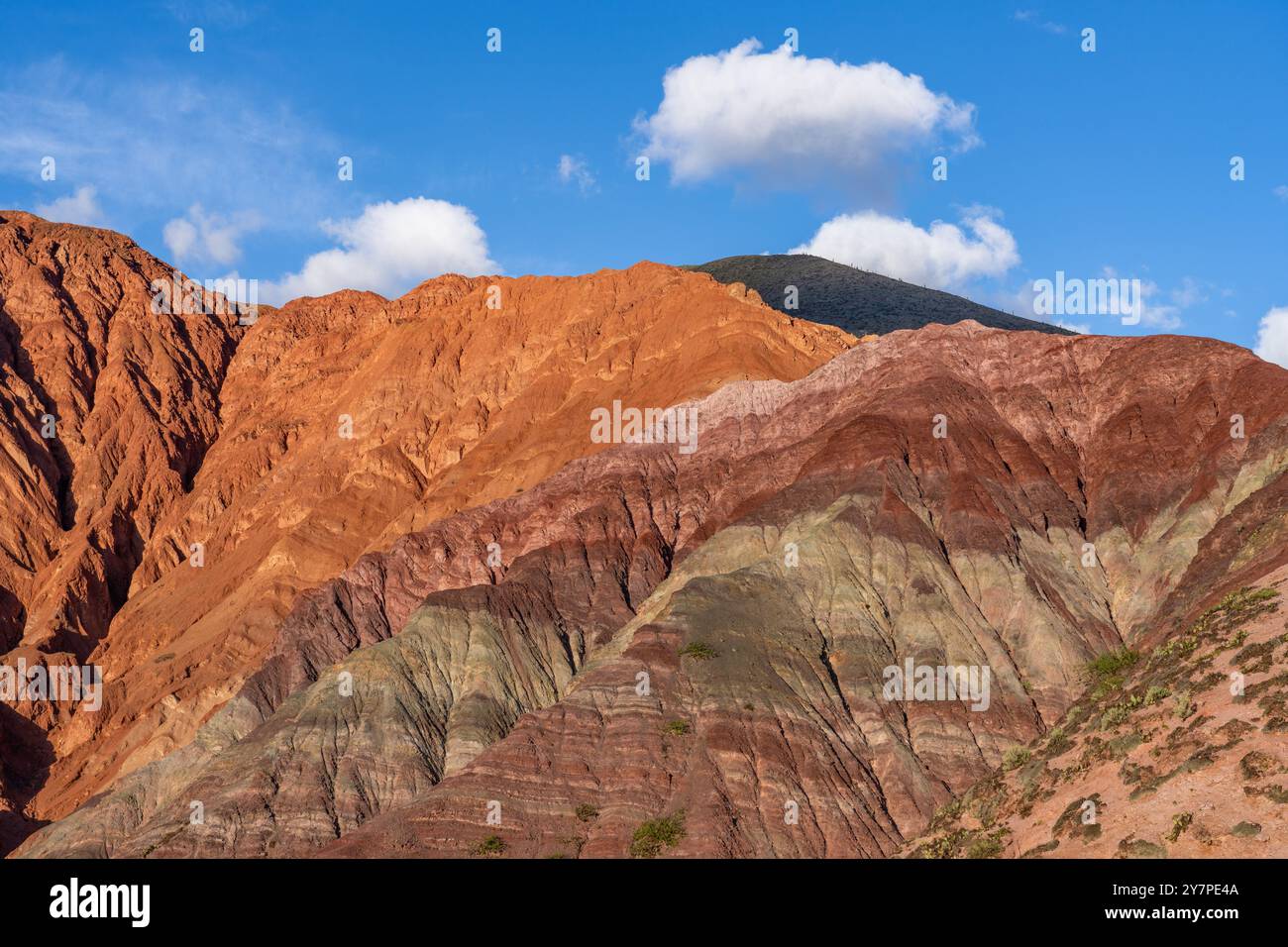 Striated rock layers in the Hill of Seven Colors or Cerro de los Siete ...