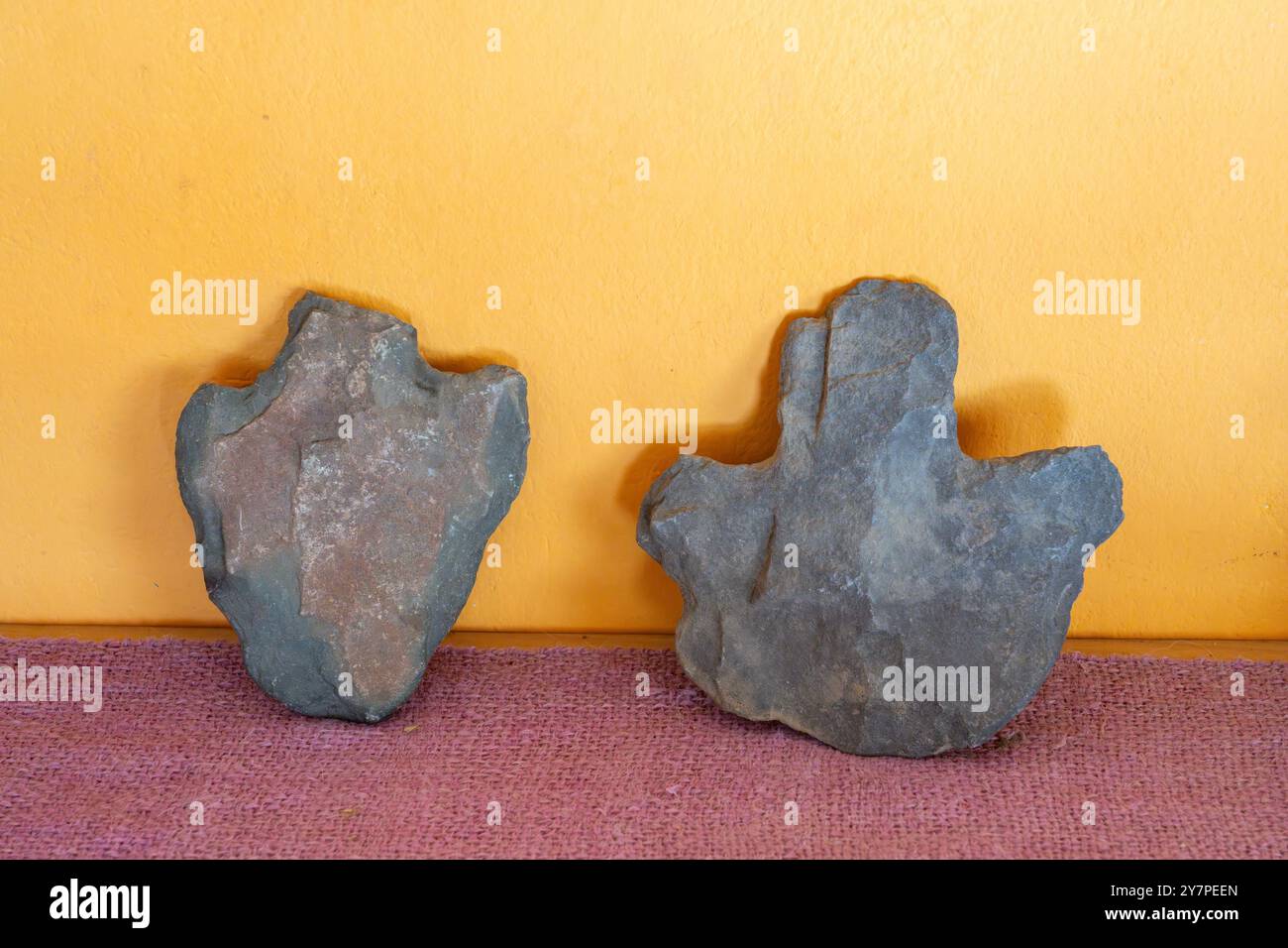 Pre-Hispanic stone ax heads in the studio of indigenous Aymara ceramic ...