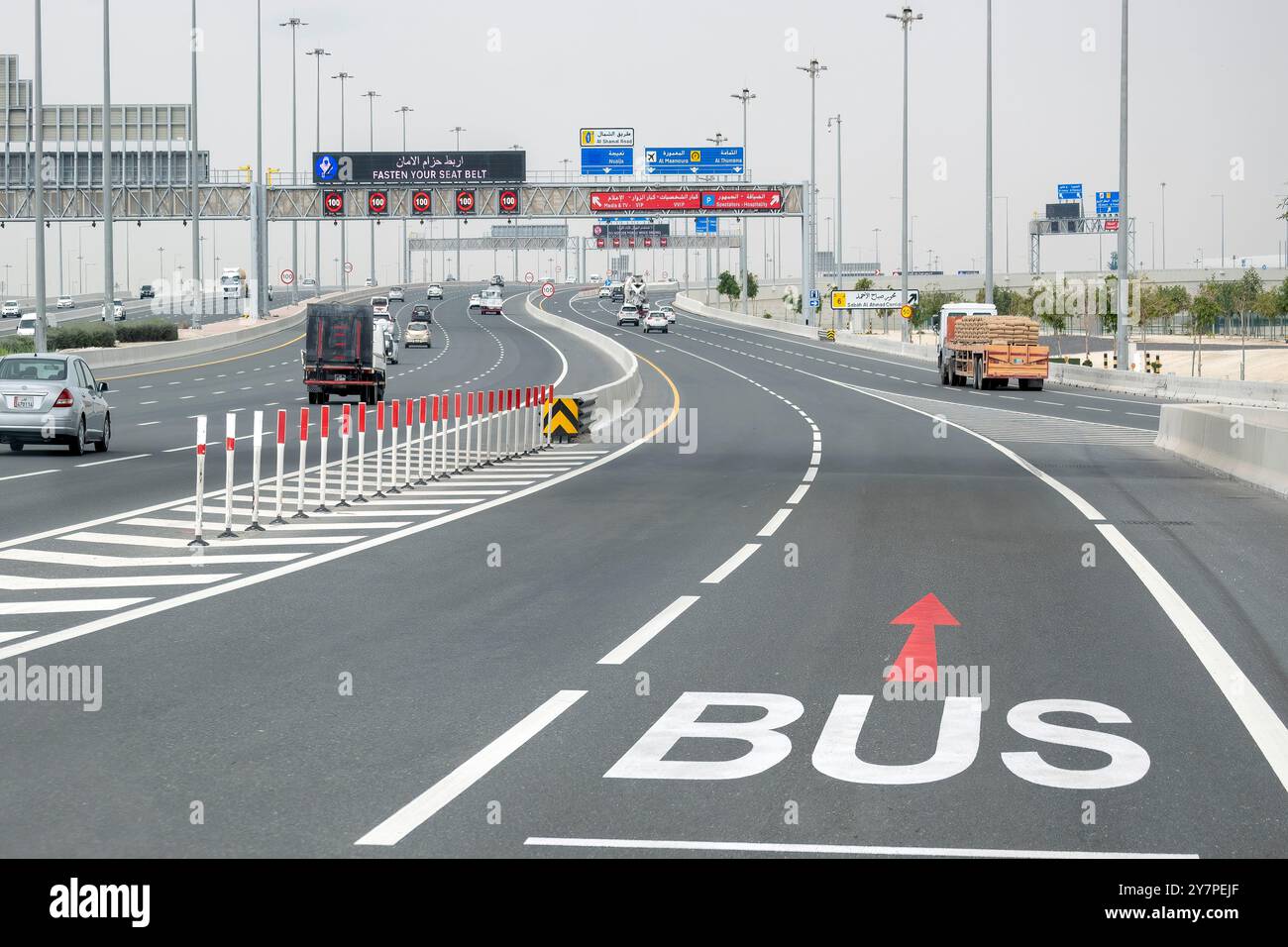 Doha road and express way. salwa road and sign board Stock Photo - Alamy